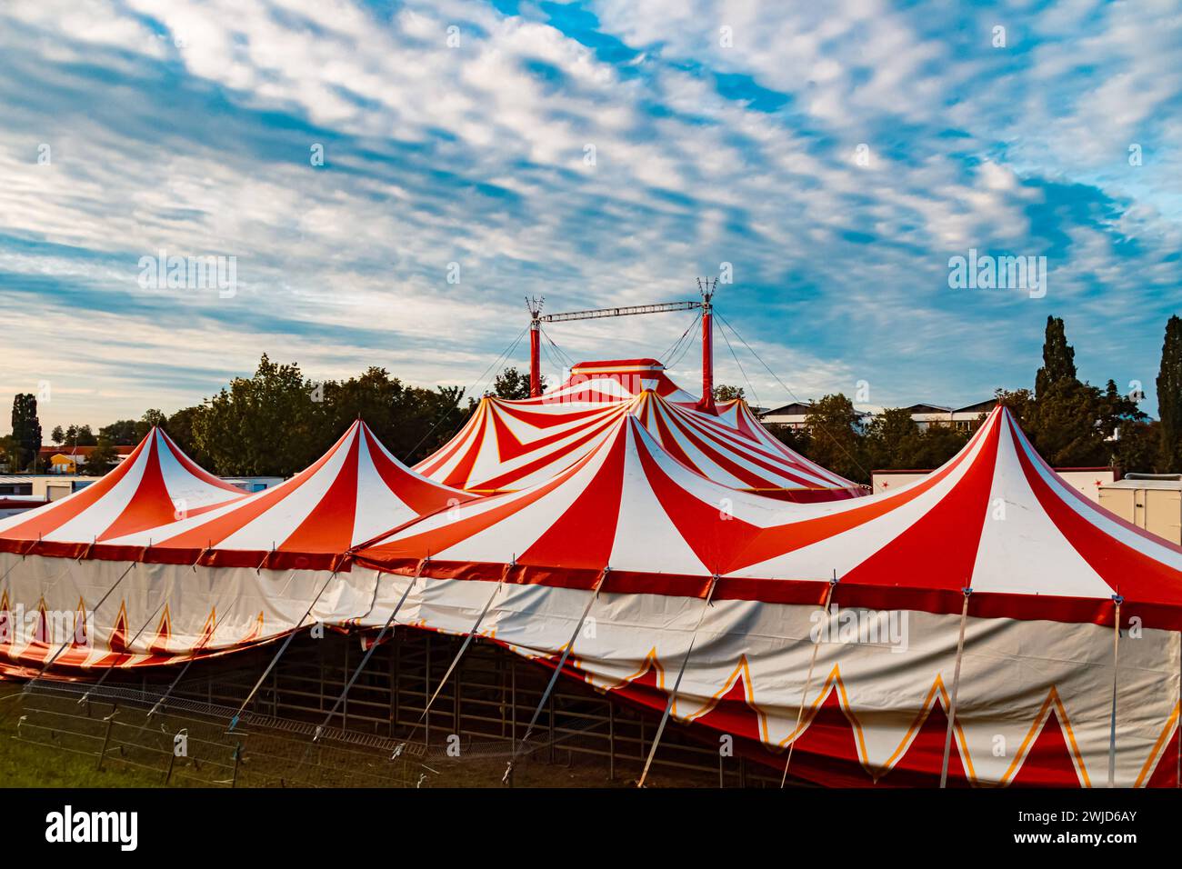 Summer view with a red and white circus tent at Landau, Isar, Bavaria ...