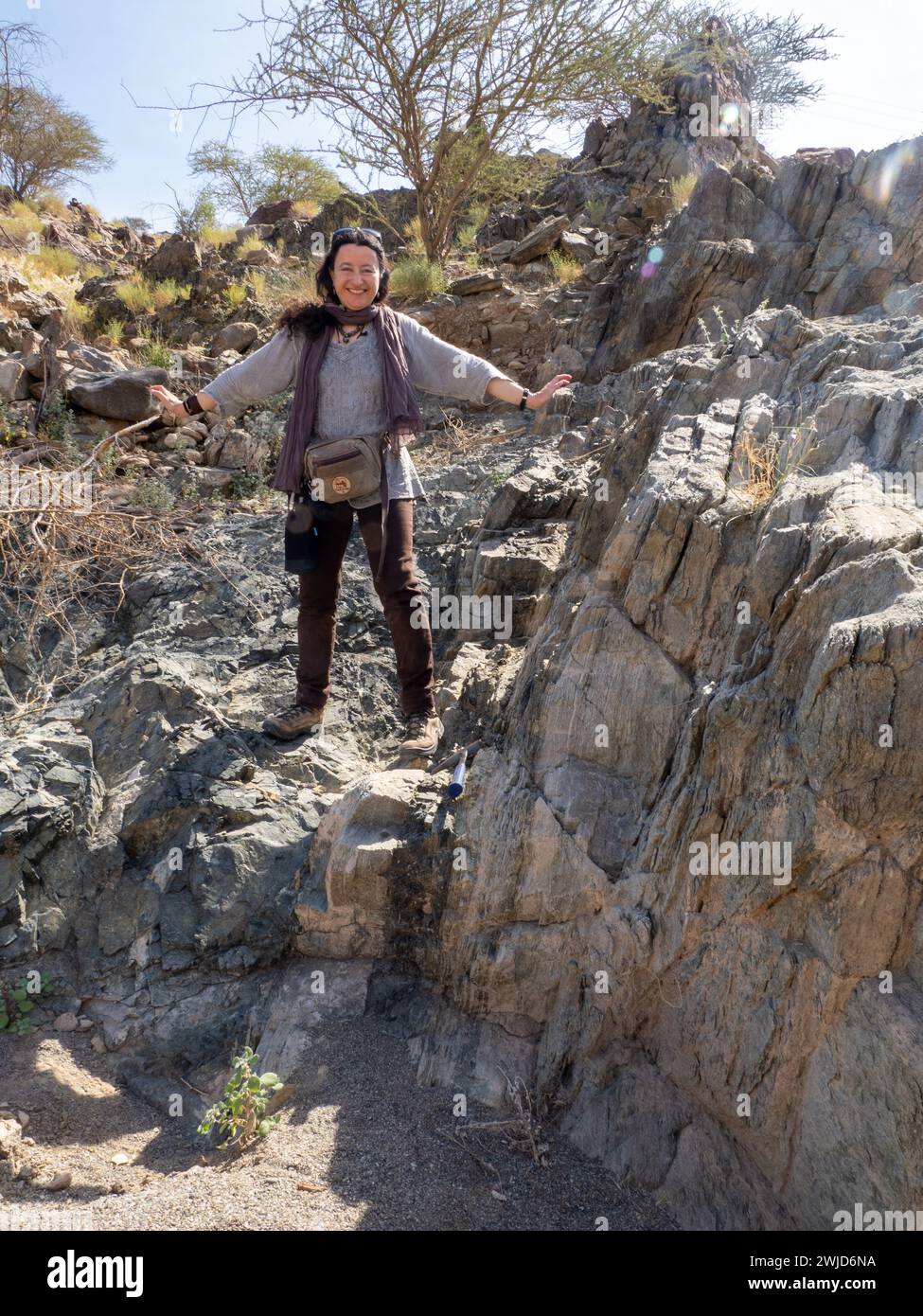 Woman standing at the boundary of the Metamorphic Sole and volcanic ...