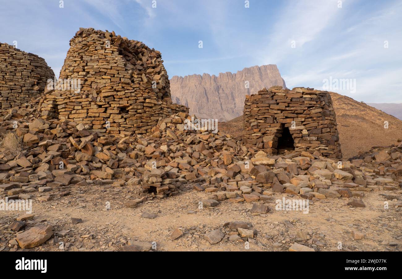Wadi Al Aya Beehive Tombs, with the Jebel Misht mountain in the ...