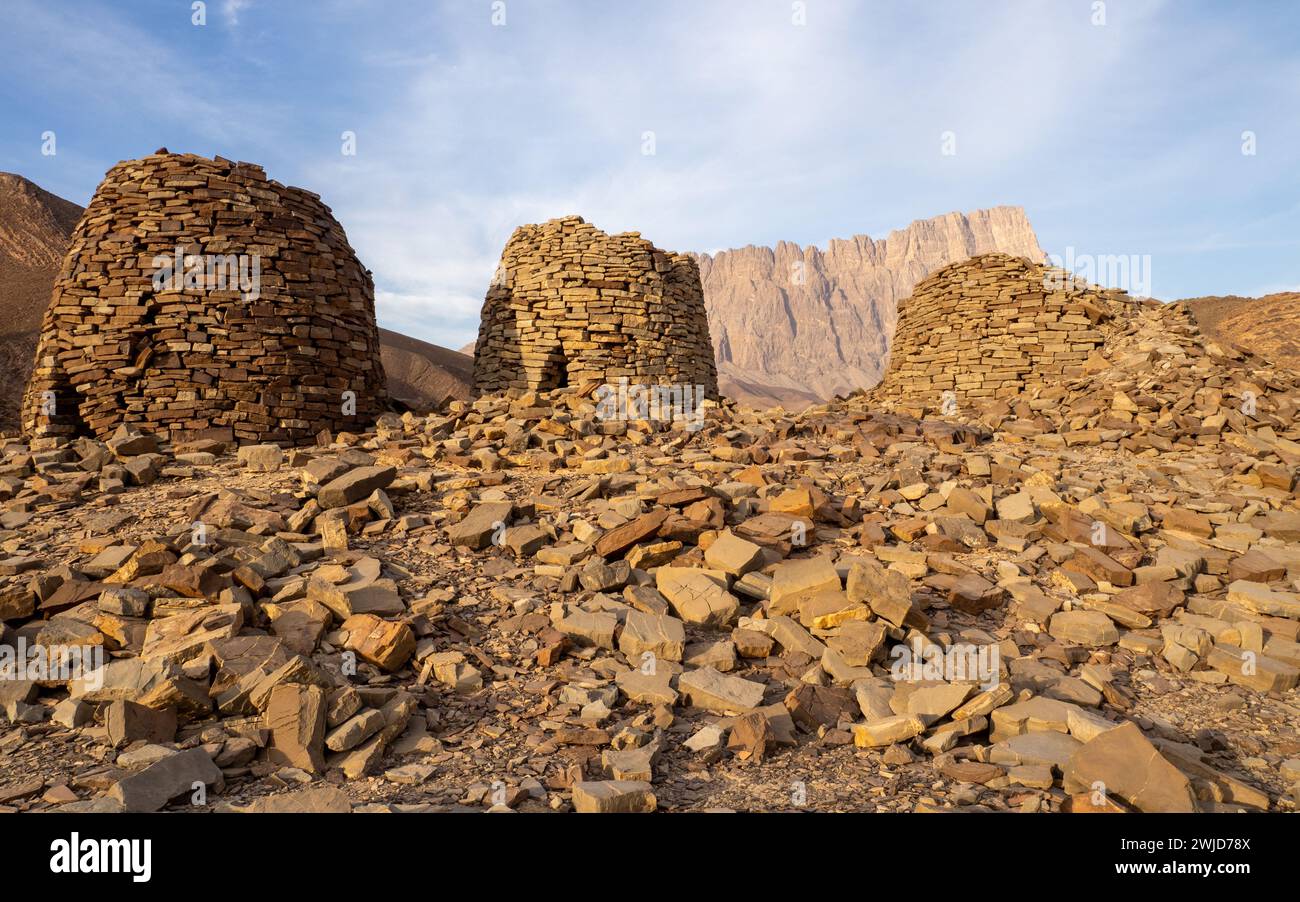 Wadi Al Aya Beehive Tombs, with the Jebel Misht mountain in the ...