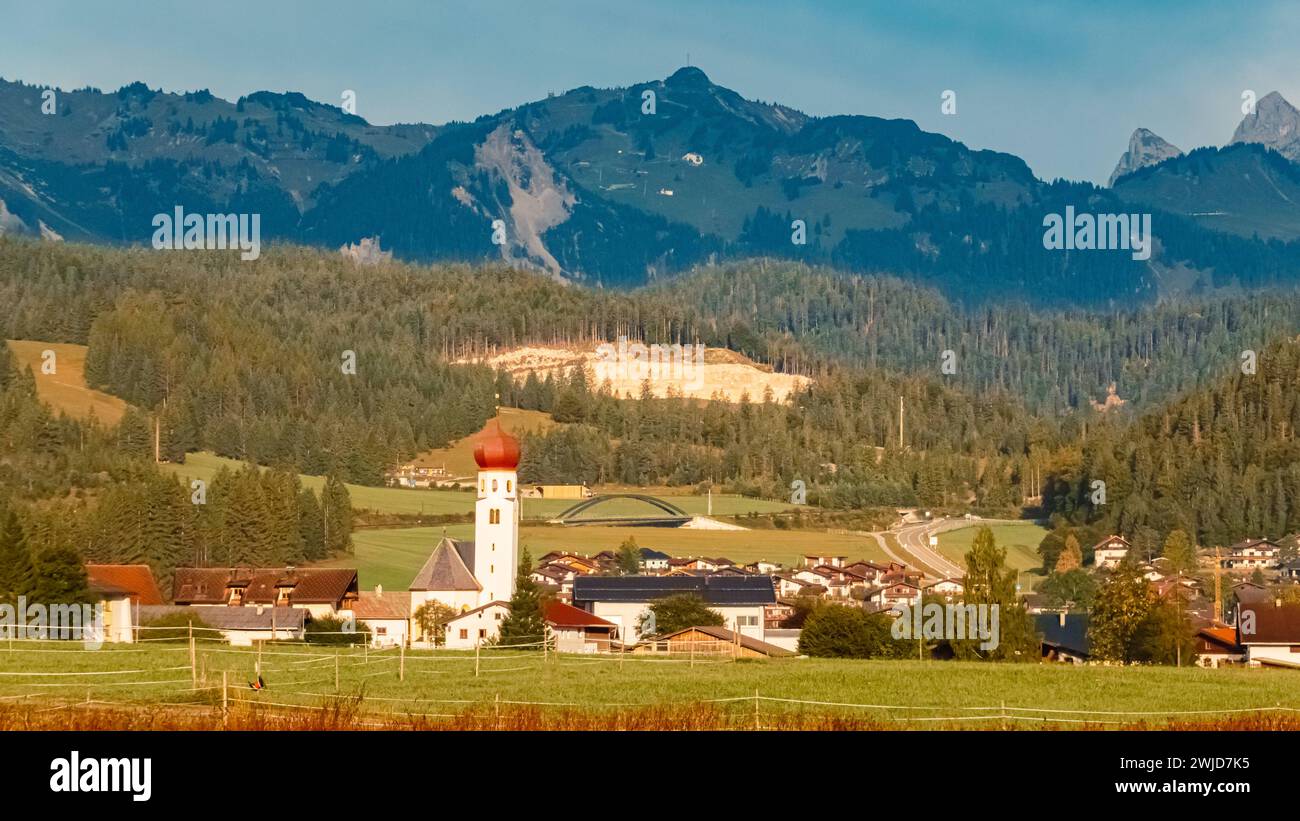 Alpine summer view with a church near Heiterwang, Reutte, Tyrol ...