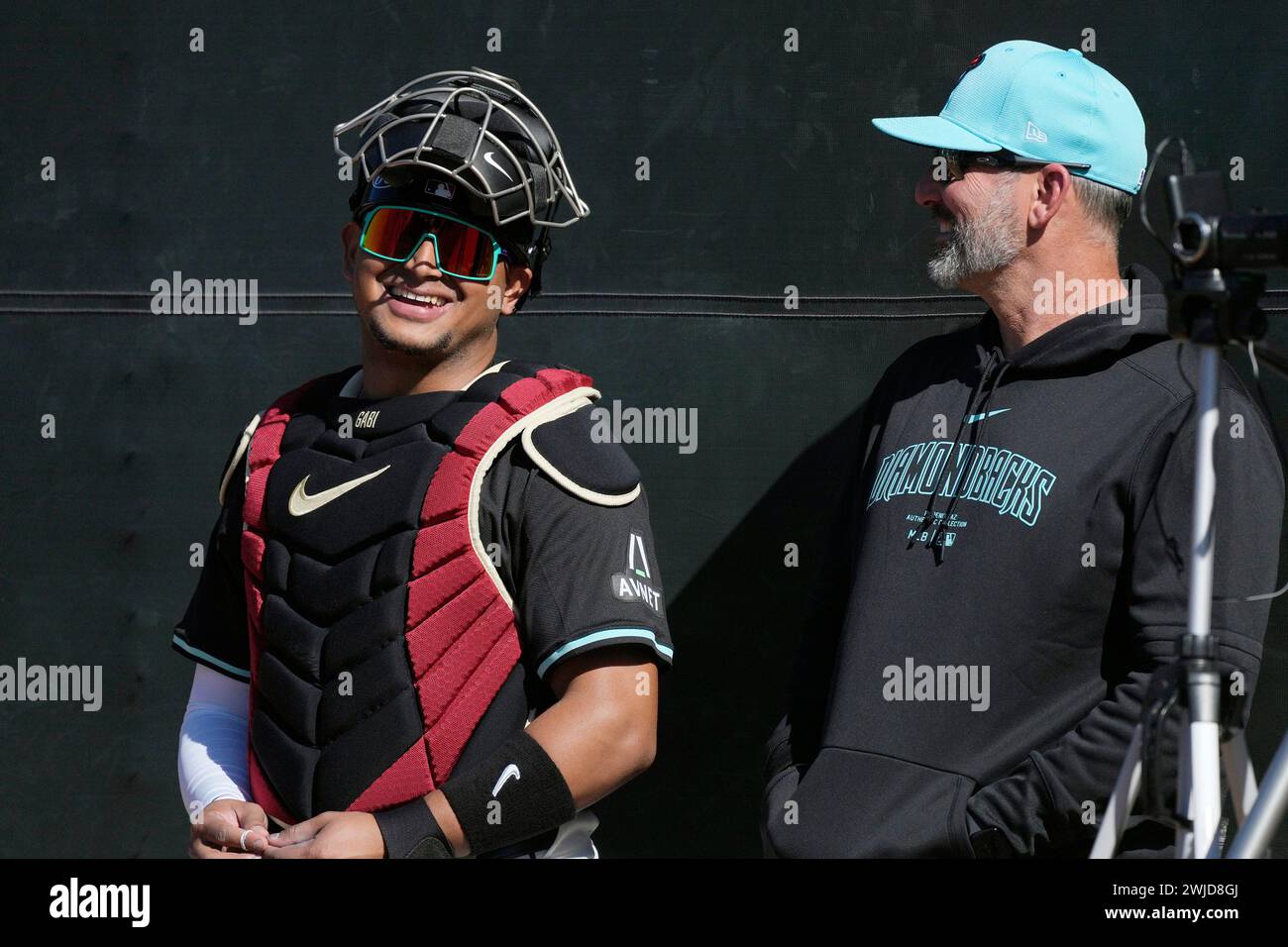 Arizona Diamondbacks manager Torey Lovullo, right, talks with ...