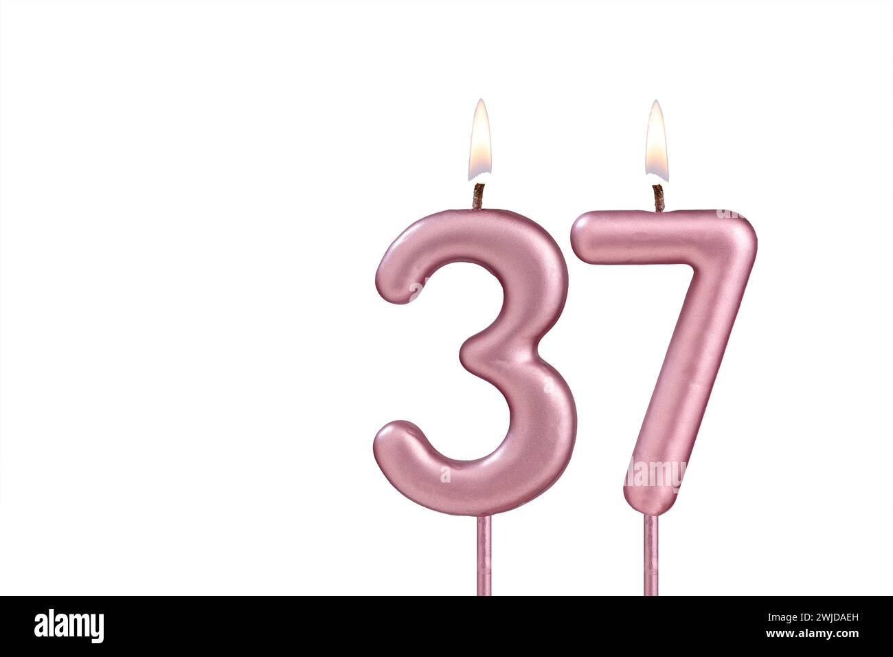 Candle number 37 - Lit birthday candle on white background Stock Photo ...