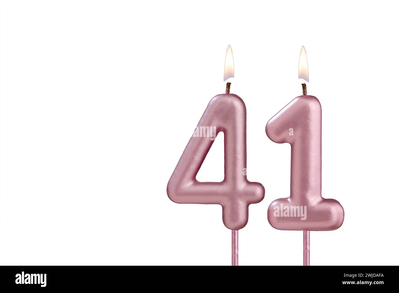 Candle number 41 - Lit birthday candle on white background Stock Photo ...