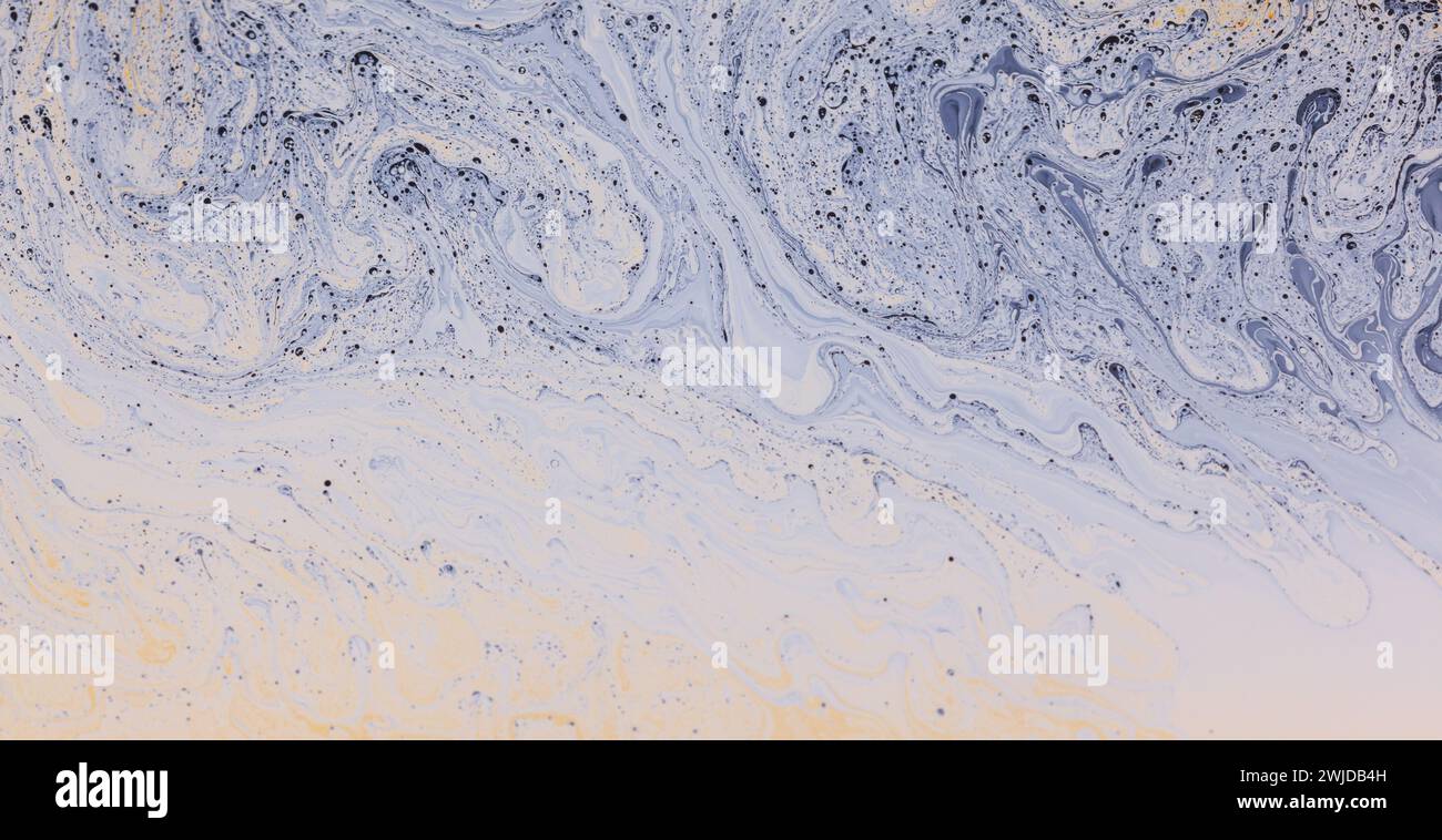 Colorful liquid mixture, blending paints in dynamic abstract fluid ...