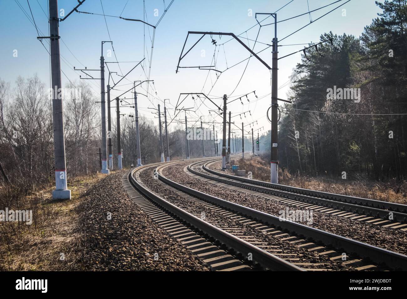 The Railway tracks with a sharp turn Stock Photo - Alamy