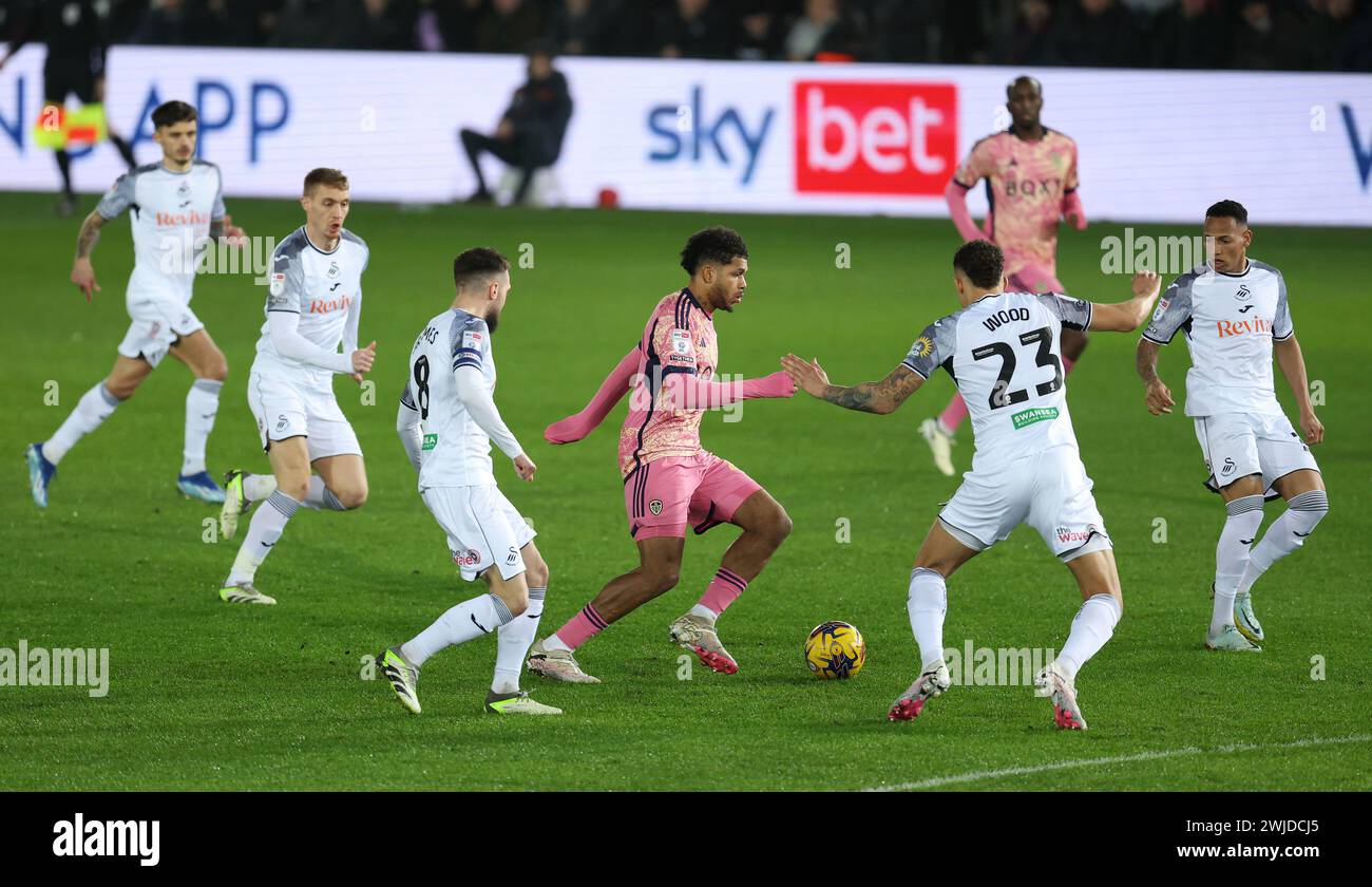 Swansea, UK. 13th Feb, 2024. Georginio Rutter of Leeds Utd (c) in ...