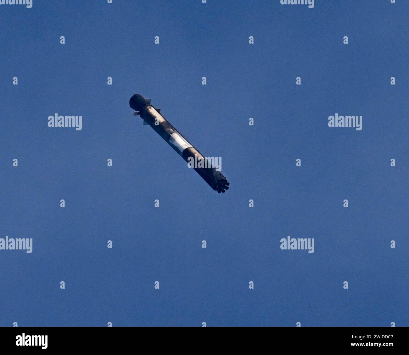 The first stage of the SpaceX Falcon 9 returns to Landing Zone 2 after ...