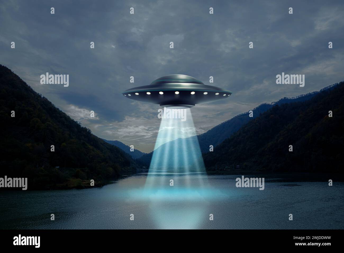 Alien spaceship emitting light beam in air over lake. UFO Stock Photo ...