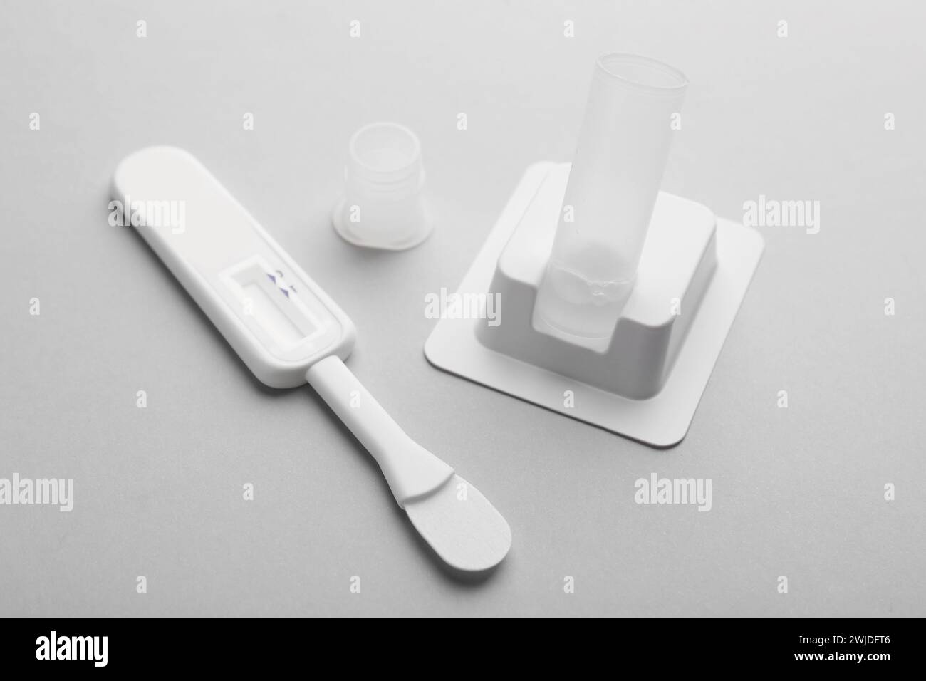 Disposable express test kit on light grey background Stock Photo - Alamy