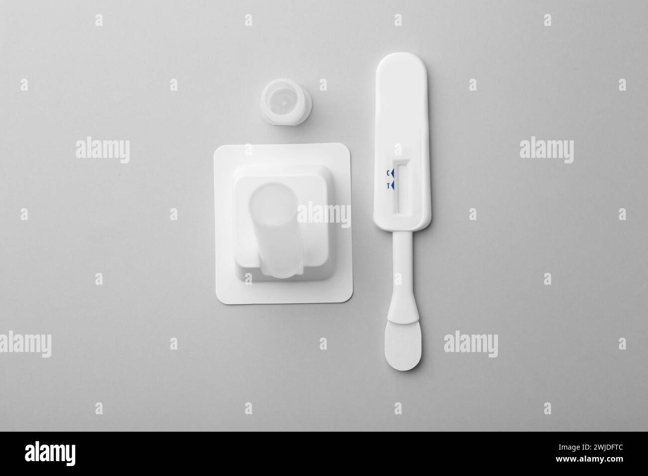 Disposable express test kit on light grey background, flat lay Stock ...