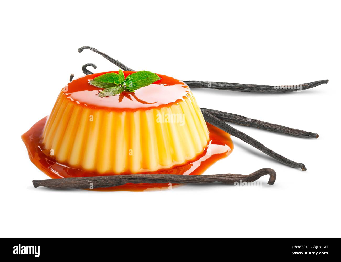 Delicious caramel pudding and vanilla pods isolated on white Stock ...