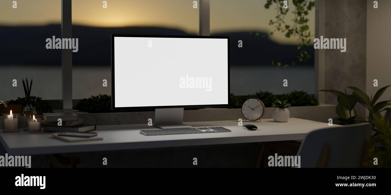 A modern home office in the evening with a white-screen PC computer ...