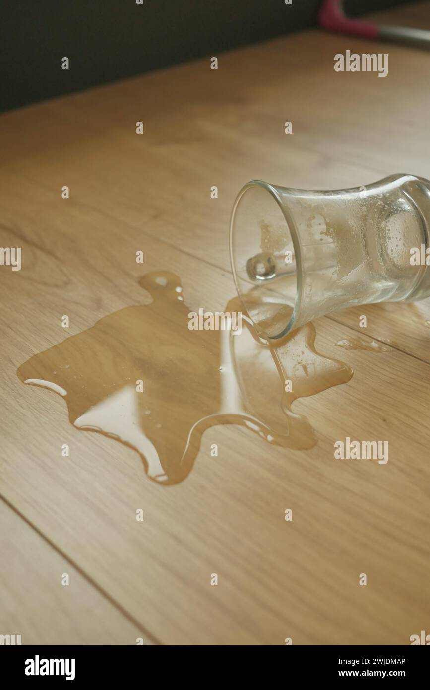 liquid spilled on a floor Stock Photo - Alamy