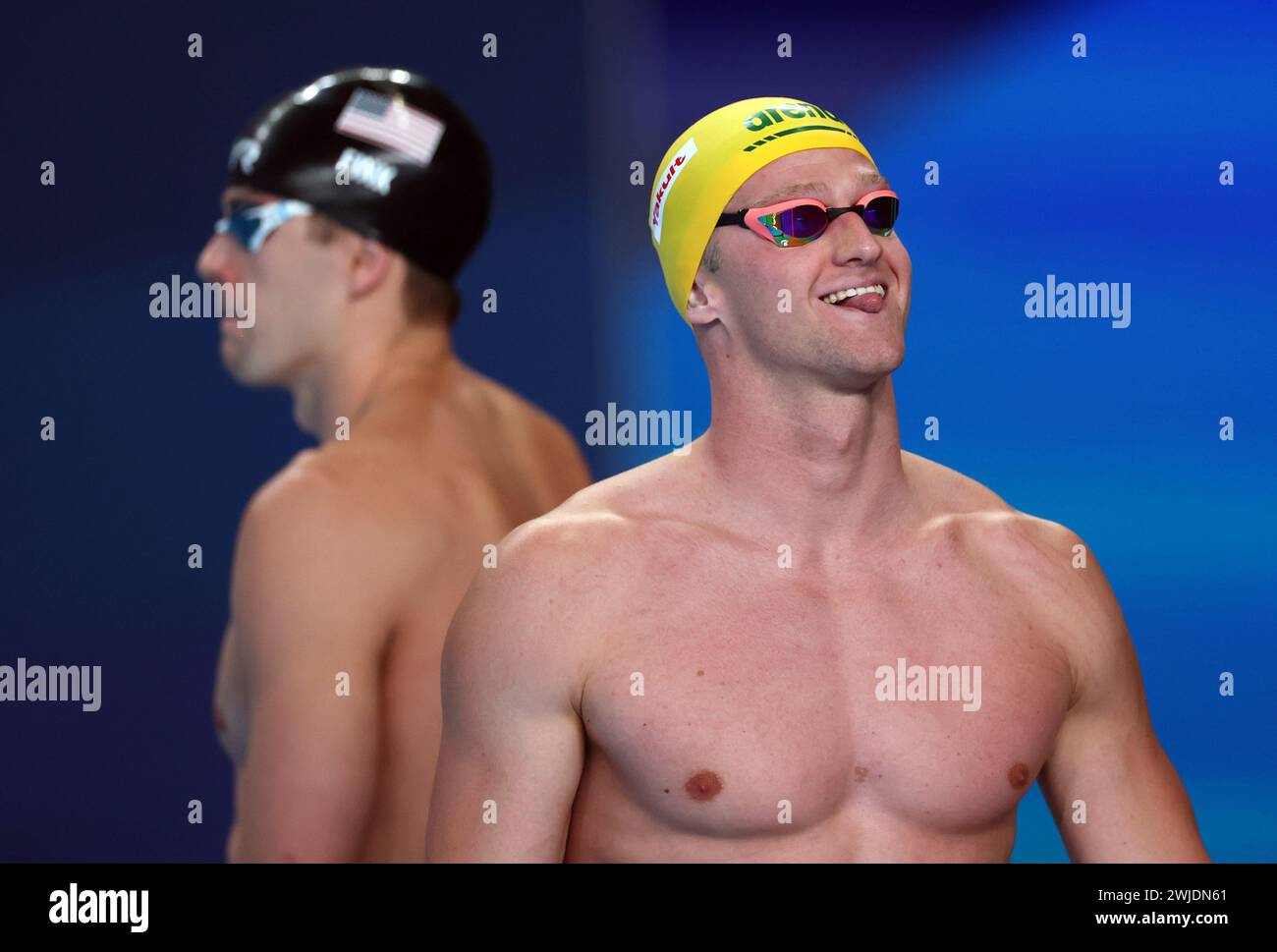 Doha, Qatar. 14th Feb, 2024. Sam Williamson (R) of Australia reacts ...