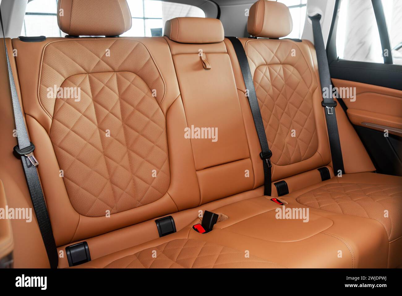 Orange leather interior design, car passenger and driver seats with ...