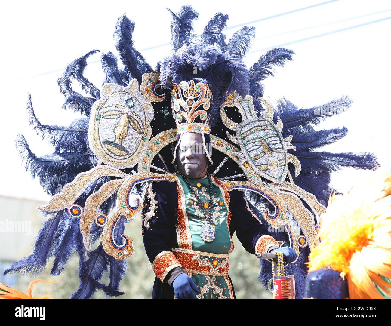 New Orleans, USA. 13th Feb, 2024. A float chief looks on from a float ...