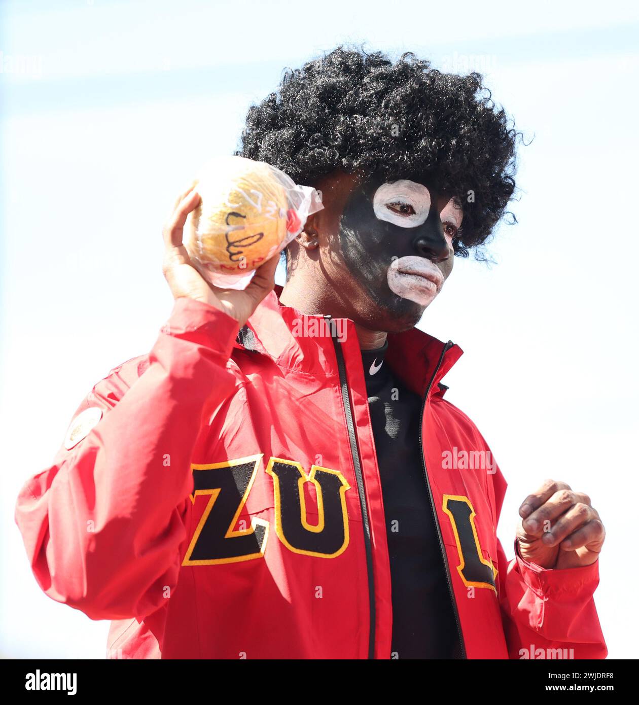 New Orleans, USA. 13th Feb, 2024. A member of the Zulu Float get ready ...