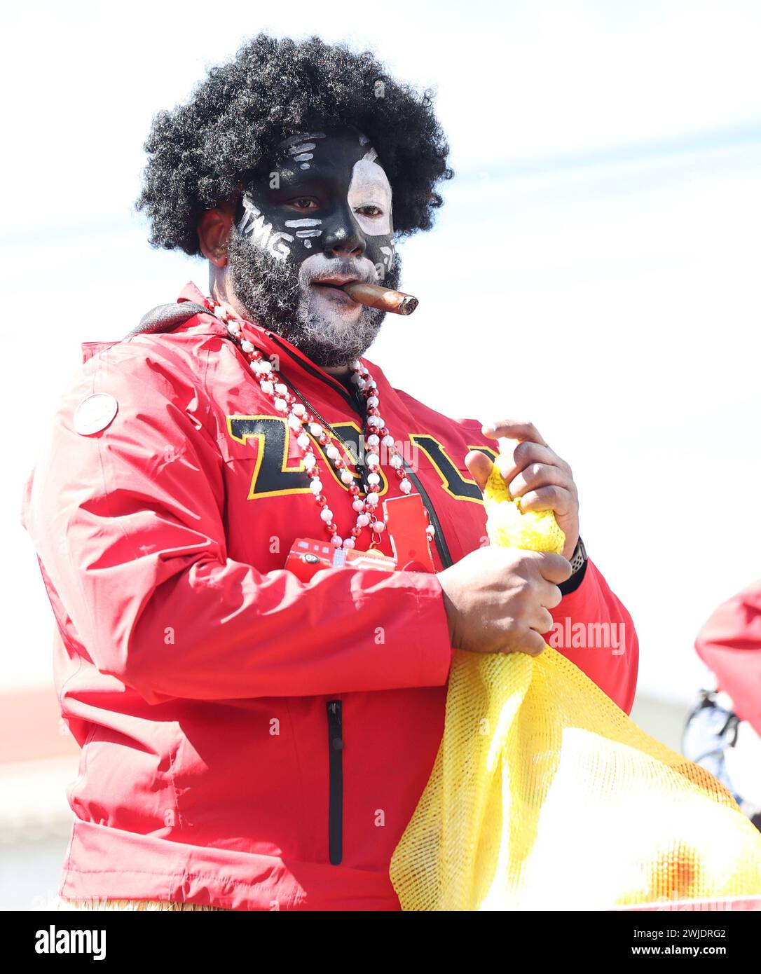 New Orleans, USA. 13th Feb, 2024. A member of the Zulu Float get ready ...