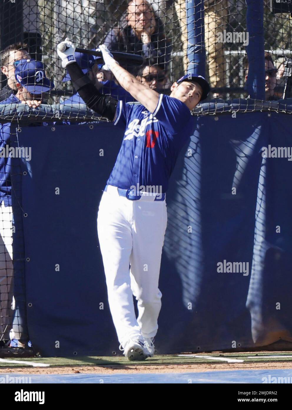 Shohei Ohtani takes batting practice at spring training with the Los ...