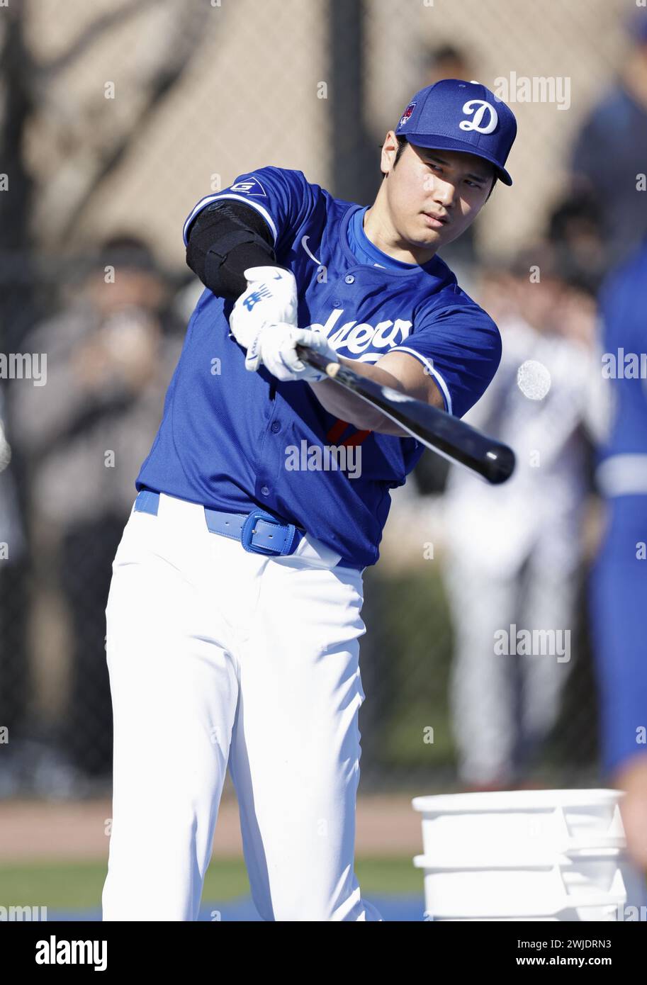 Shohei Ohtani takes batting practice at spring training with the Los ...