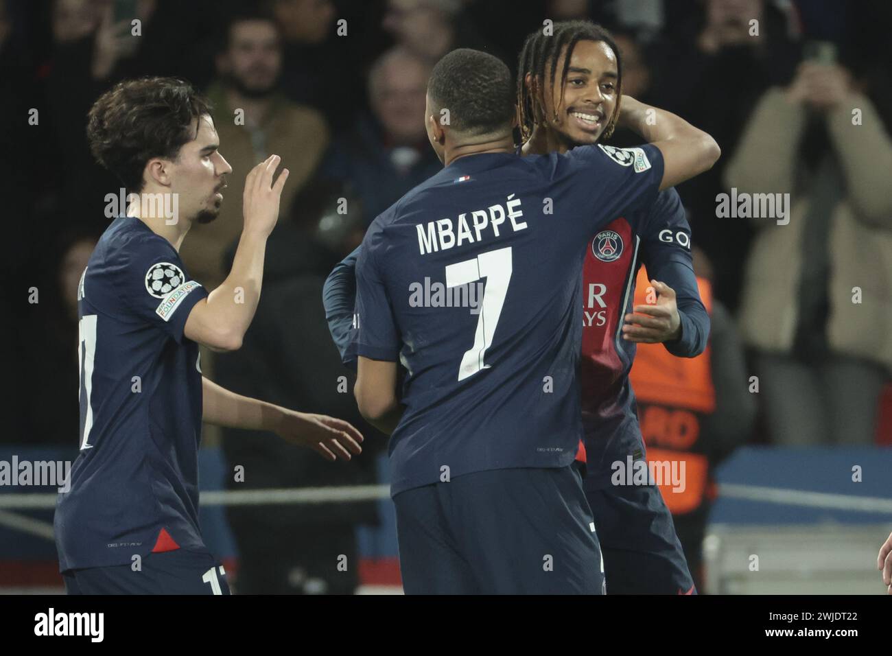 Bradley Barcola of PSG celebrates his goal with Kylian Mbappe, left ...