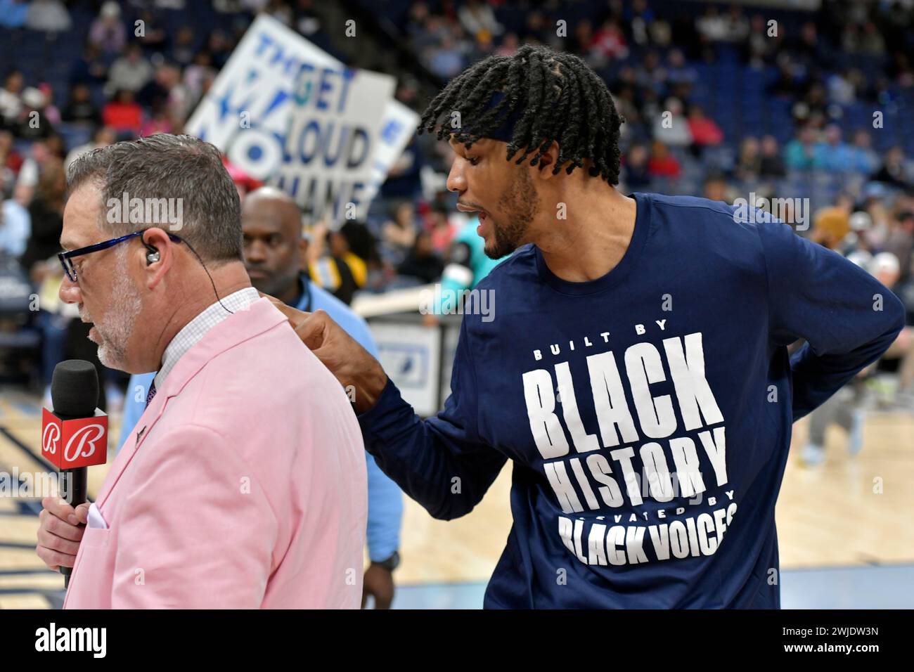 Memphis Grizzlies forward Ziaire Williams jokes with broadcaster Rob ...