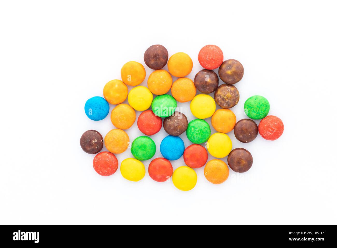 Colorful candy chocolate buttons on white isolated background Stock ...