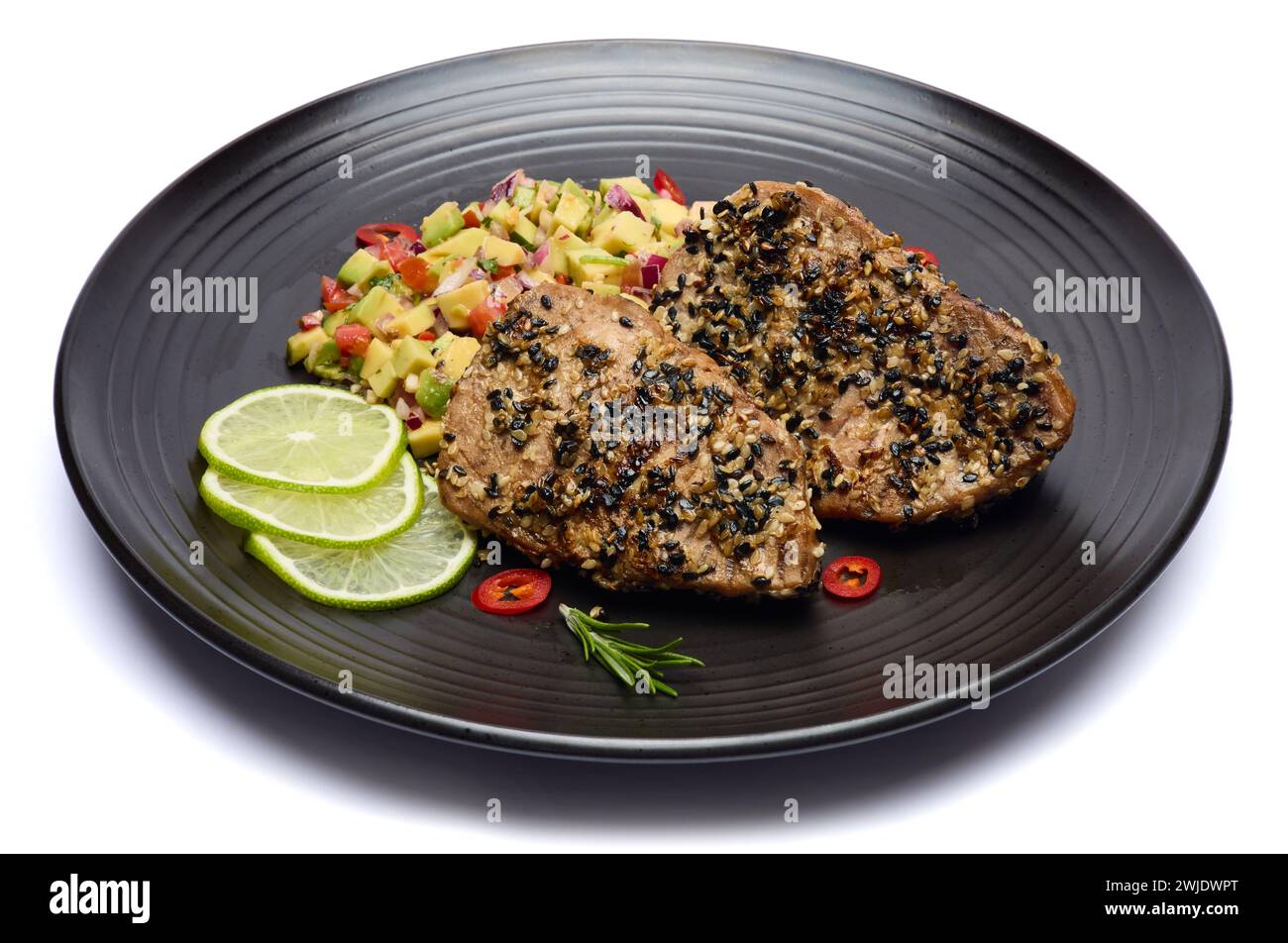 pieces of Organic grilled Tuna fillet covered with sesame seeds and ...
