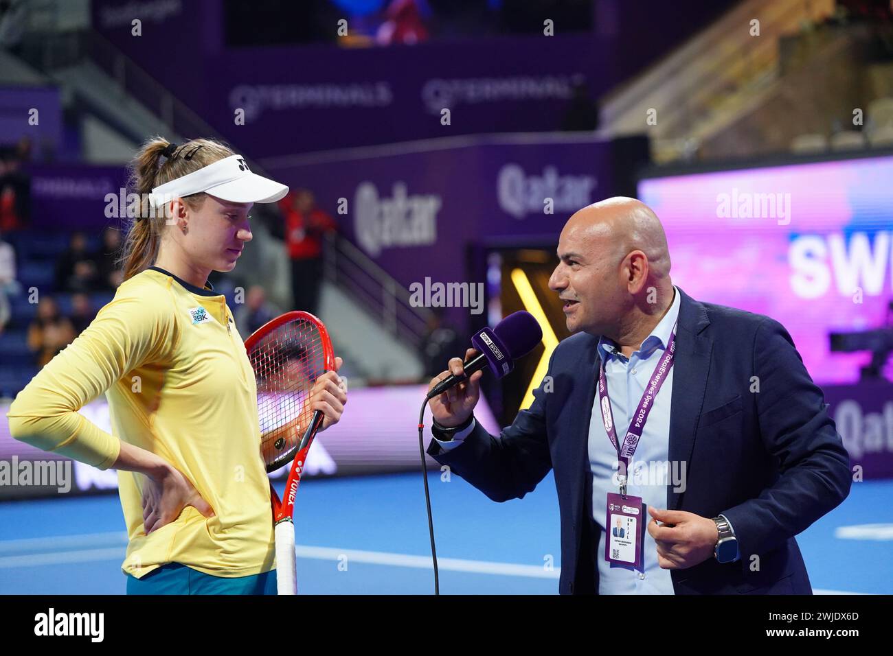 Elena Rybakina during a post-match interview by the court side after ...