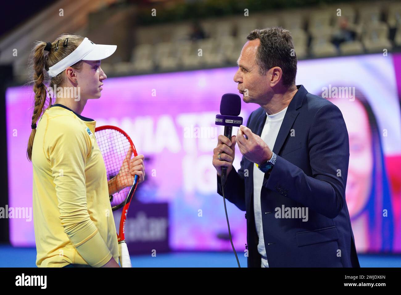 Elena Rybakina during a post-match interview by the court side after ...