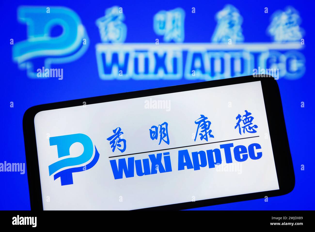 Ukraine. 14th Feb, 2024. In this photo illustration, WuXi AppTec logo is seen on a smartphone ...