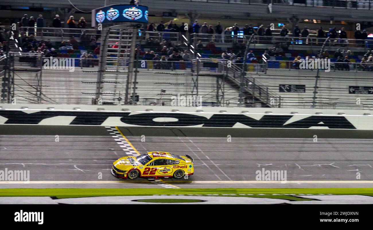 Daytona, United States. 14th Feb, 2024. Joey Logano crosses the finish ...