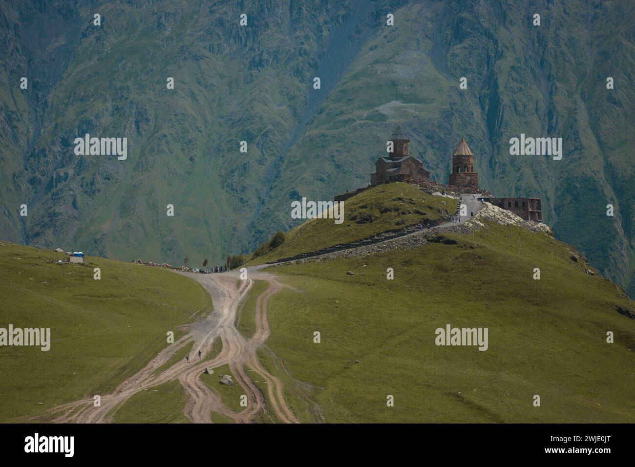The kazbegi trinity, a magical church and worship place high up in ...