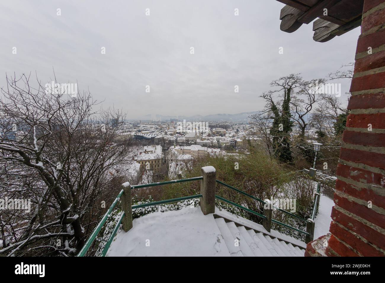 Famous clockhouse on schlossberg hill in Graz on a cold winter day ...