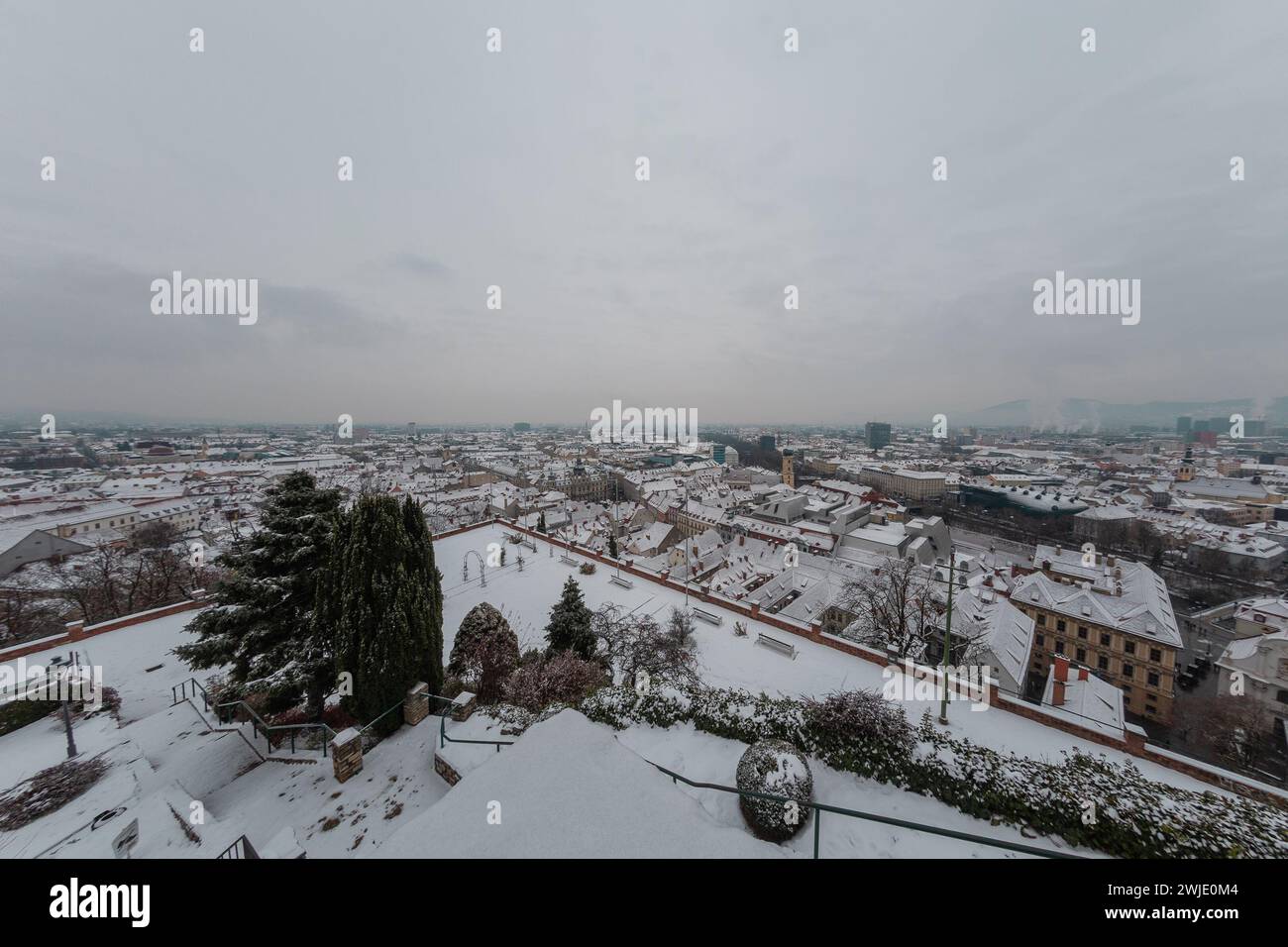 Famous clockhouse on schlossberg hill in Graz on a cold winter day ...