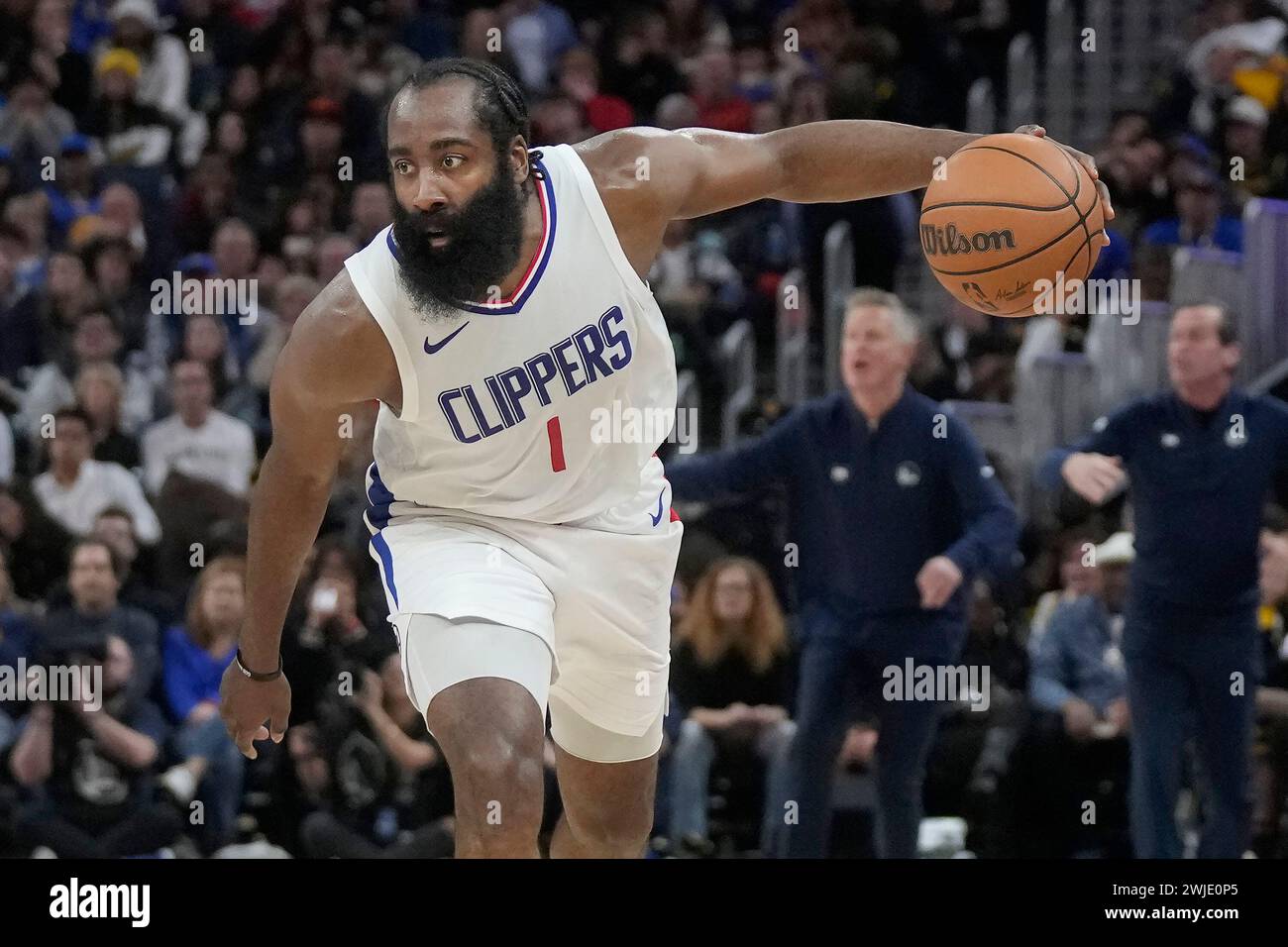 Los Angeles Clippers guard James Harden brings the ball up against the ...