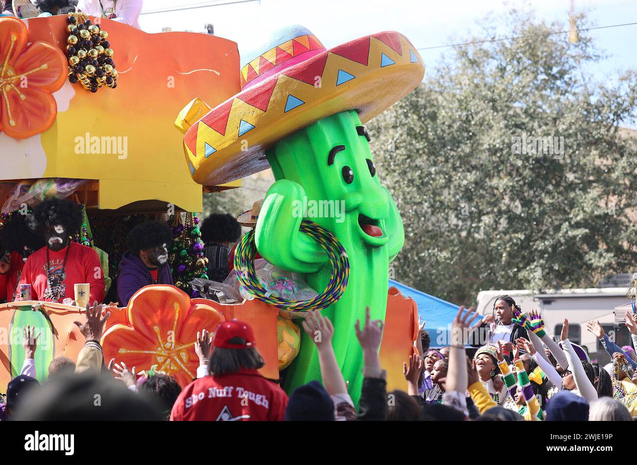 New Orleans, USA. 13th Feb, 2024. A float with a giant cactus wearing a ...