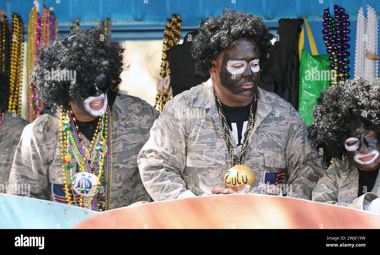 New Orleans, USA. 13th Feb, 2024. Members of the Zulu float look into ...
