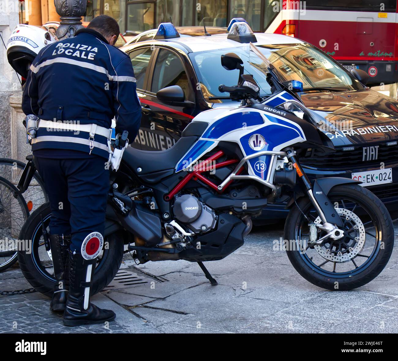 Italian Polizia Locale keeping safety in Bologna Stock Photo - Alamy
