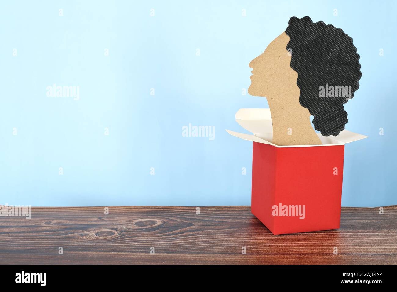 Woman paper cutout coming outside of box. Women coming out, empowerment ...