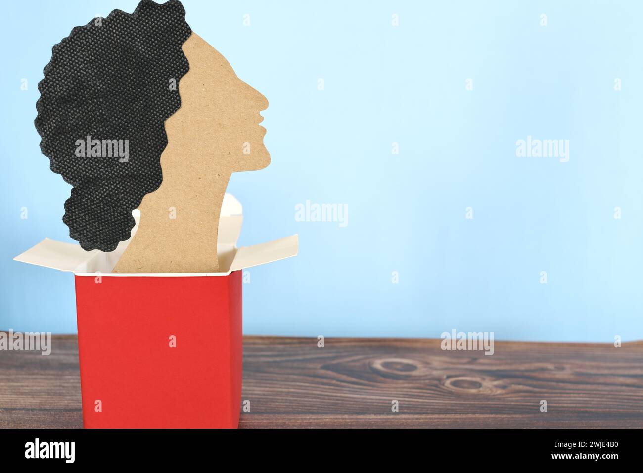 Woman paper cutout coming outside of box. Women coming out, empowerment ...