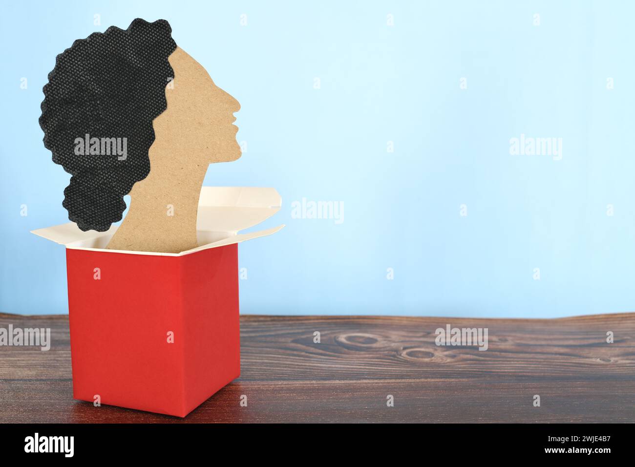 Woman paper cutout coming outside of box. Women coming out, empowerment ...