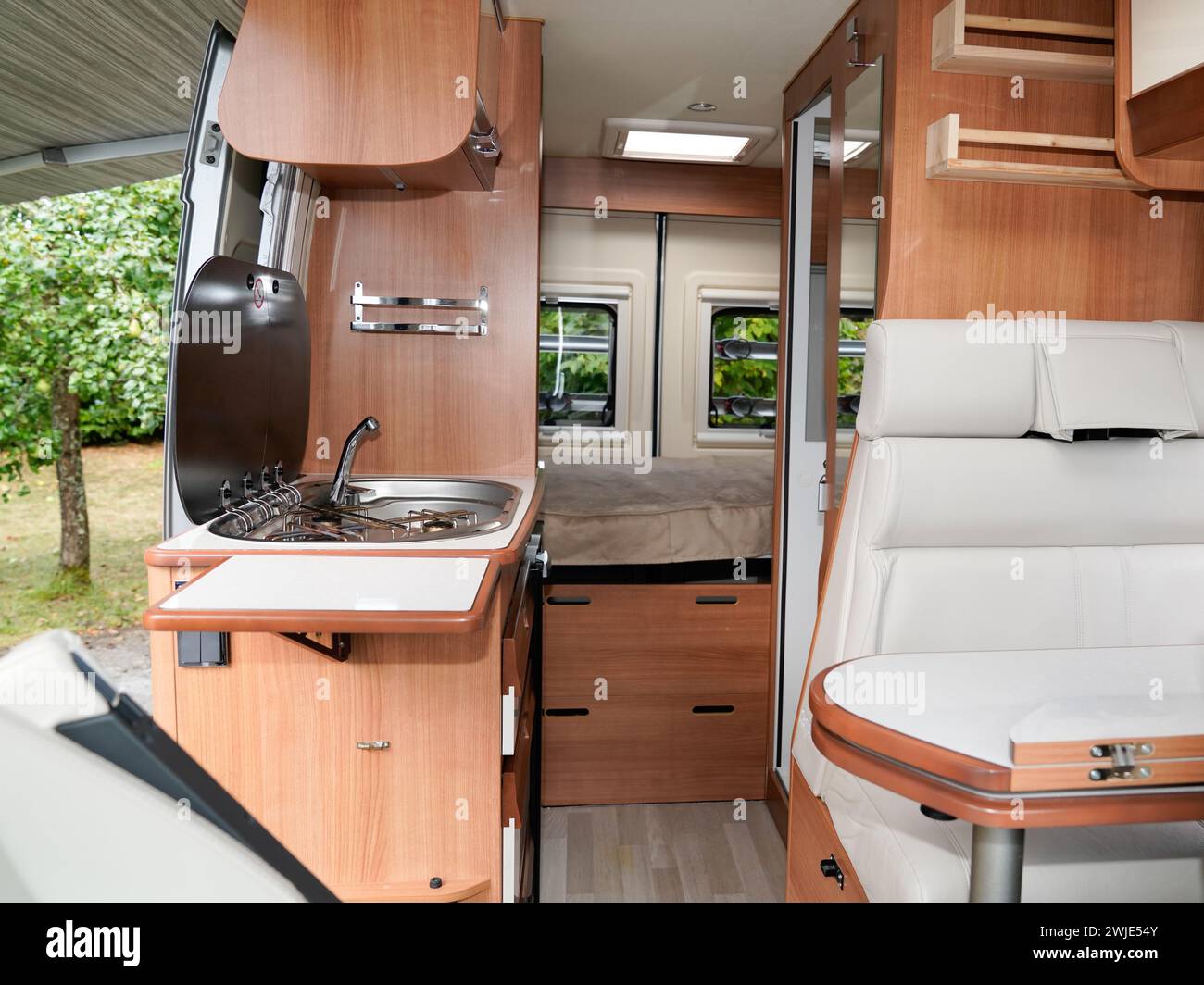 camper van motorhome inside new modern wooden interior Stock Photo - Alamy