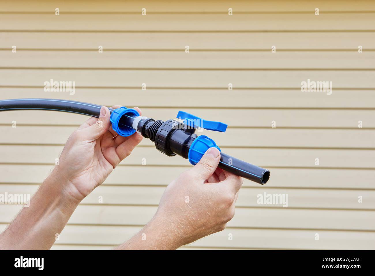 HDPE pipe is placed in compression valve fitting, which will be held in ...