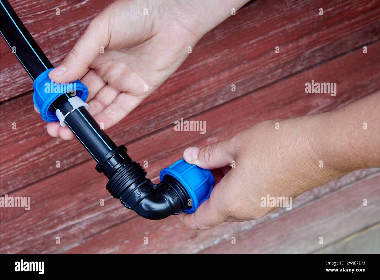 Compression clamp system with threaded nut on PP elbow fitting for ...