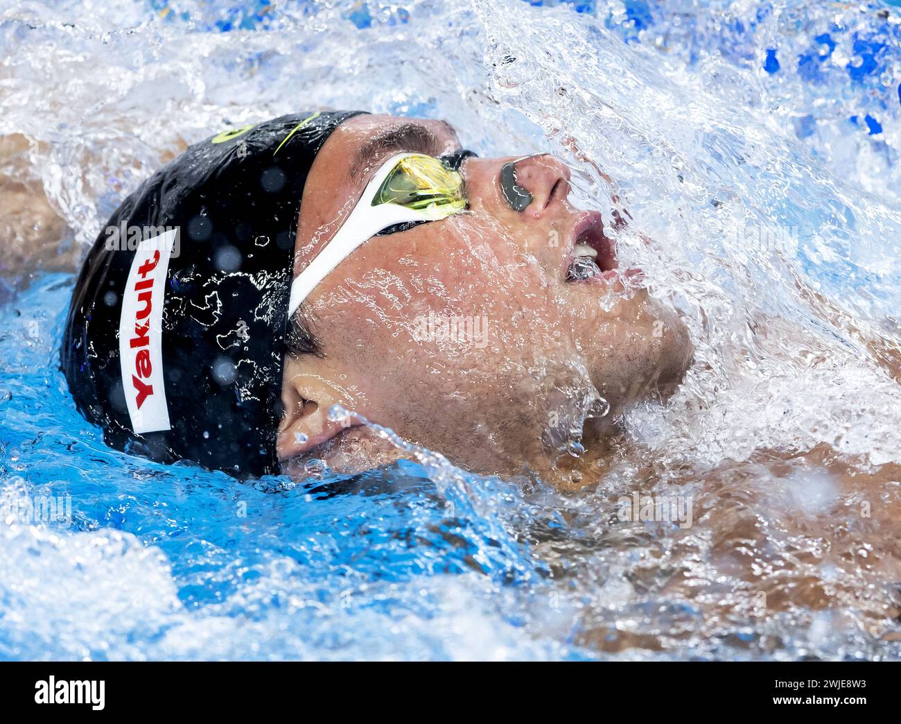 DOHA - Kai van Westering in action in the men's 200 back on the fifth ...