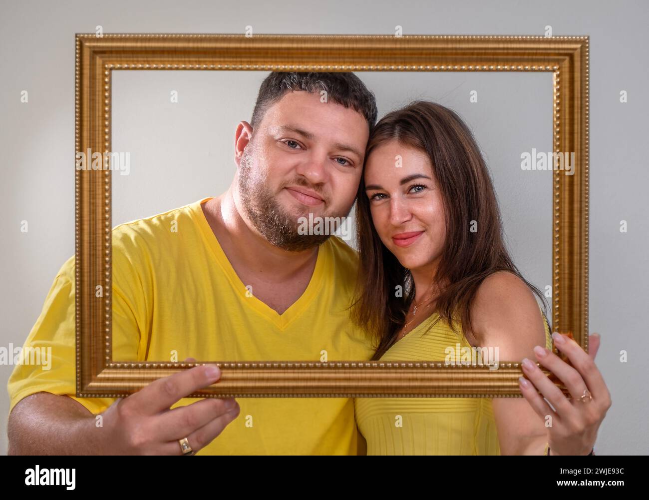 Romantic couple in picture frame hi-res stock photography and images ...