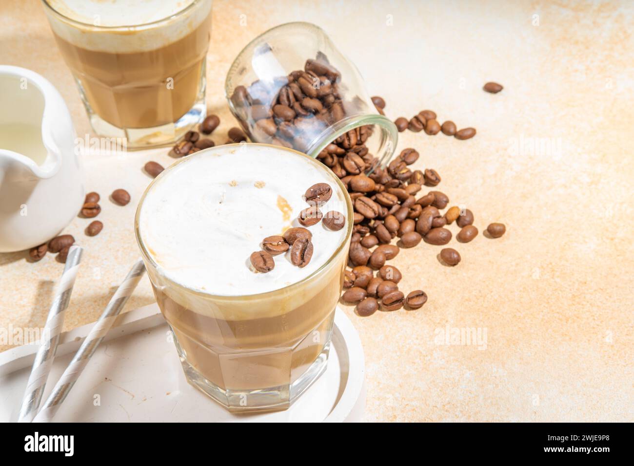 Cold dairy coffee drink with milk, whipped cream. Foamy frappe, latte ...