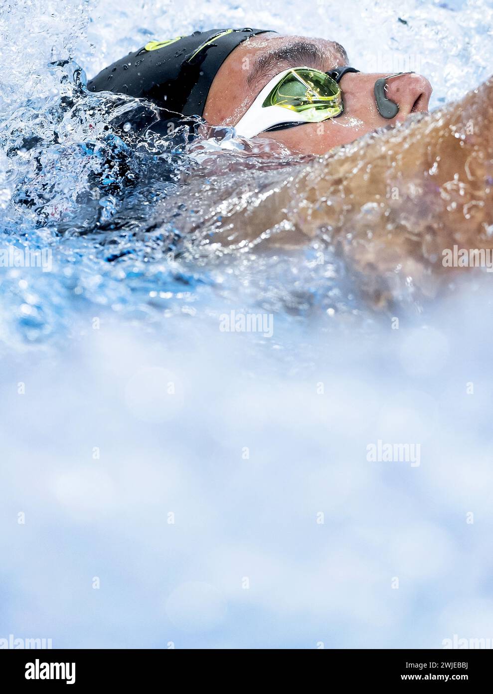 DOHA - Kai van Westering in action on the men's 200 back on the fifth ...